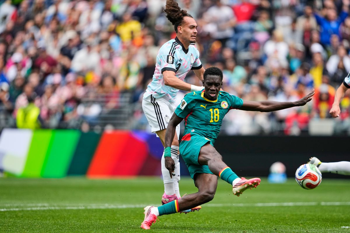 Belgium converts late penalty to beat Senegal 3-2 in extra time in the ...