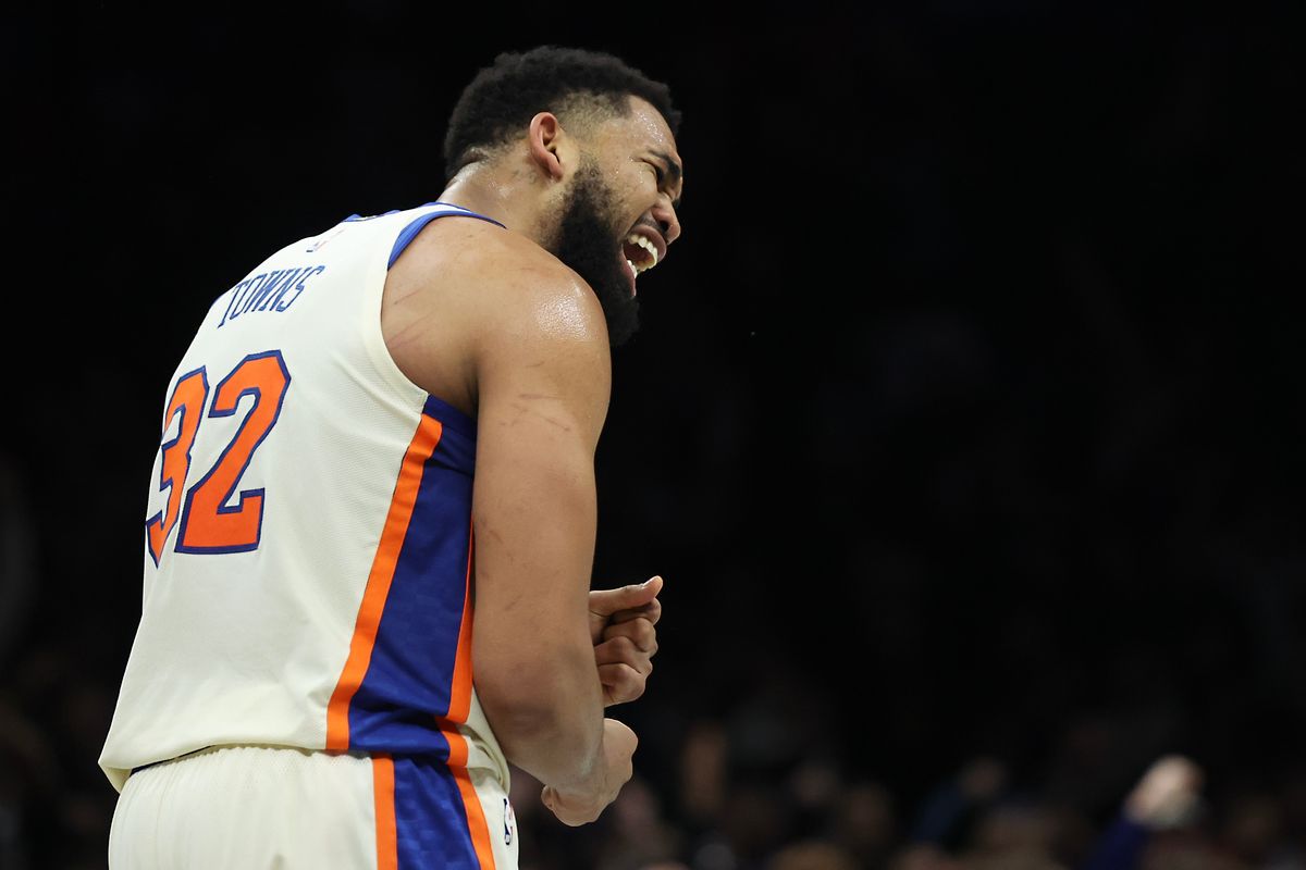 Knicks edge Nets 93-92 for their 14th straight victory in the New York ...